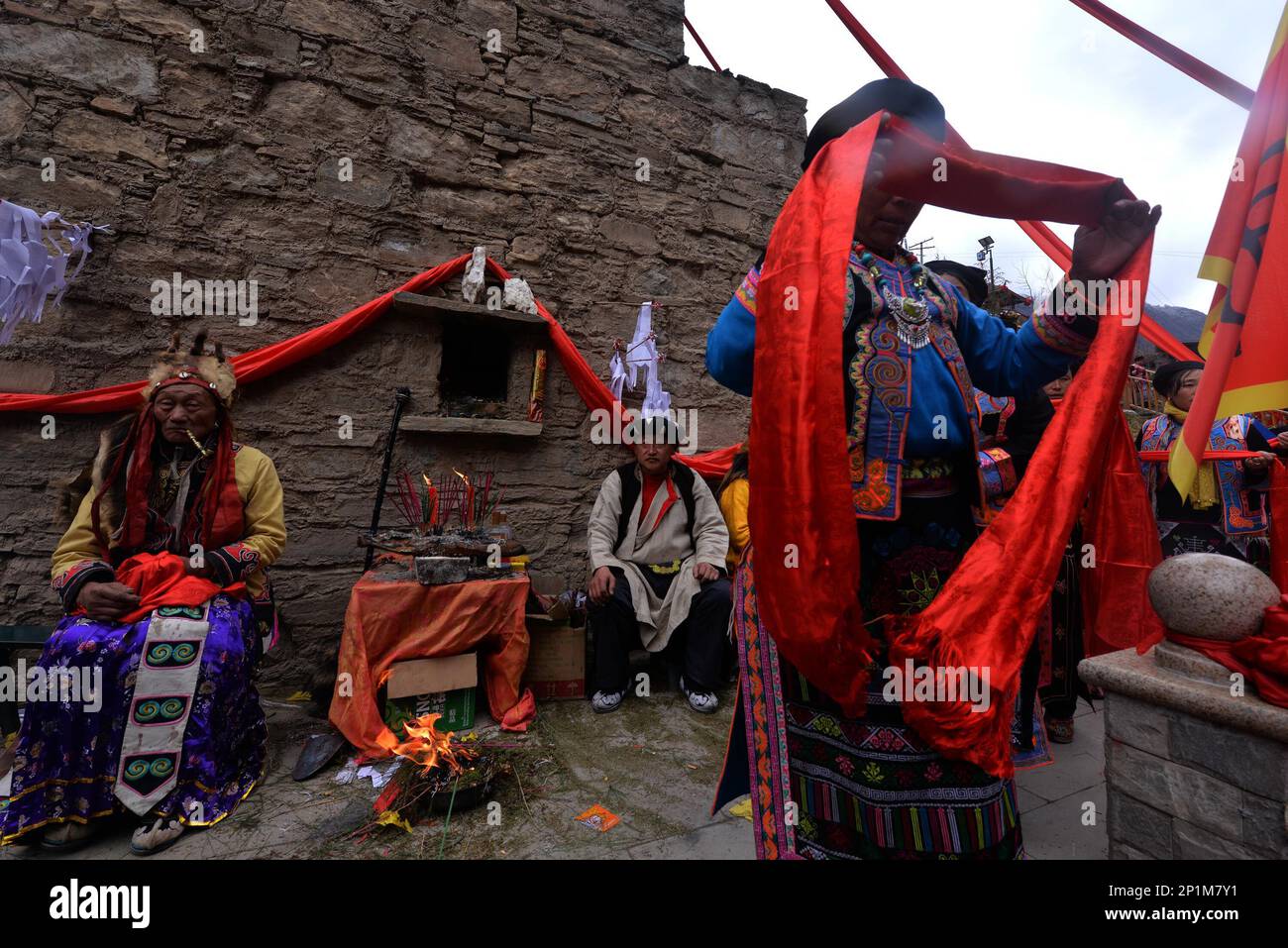 Qiang ethnic minority people worship gods and pray for good luck during ...