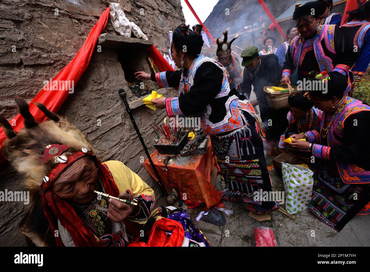 Qiang ethnic minority people worship gods and pray for good luck during ...