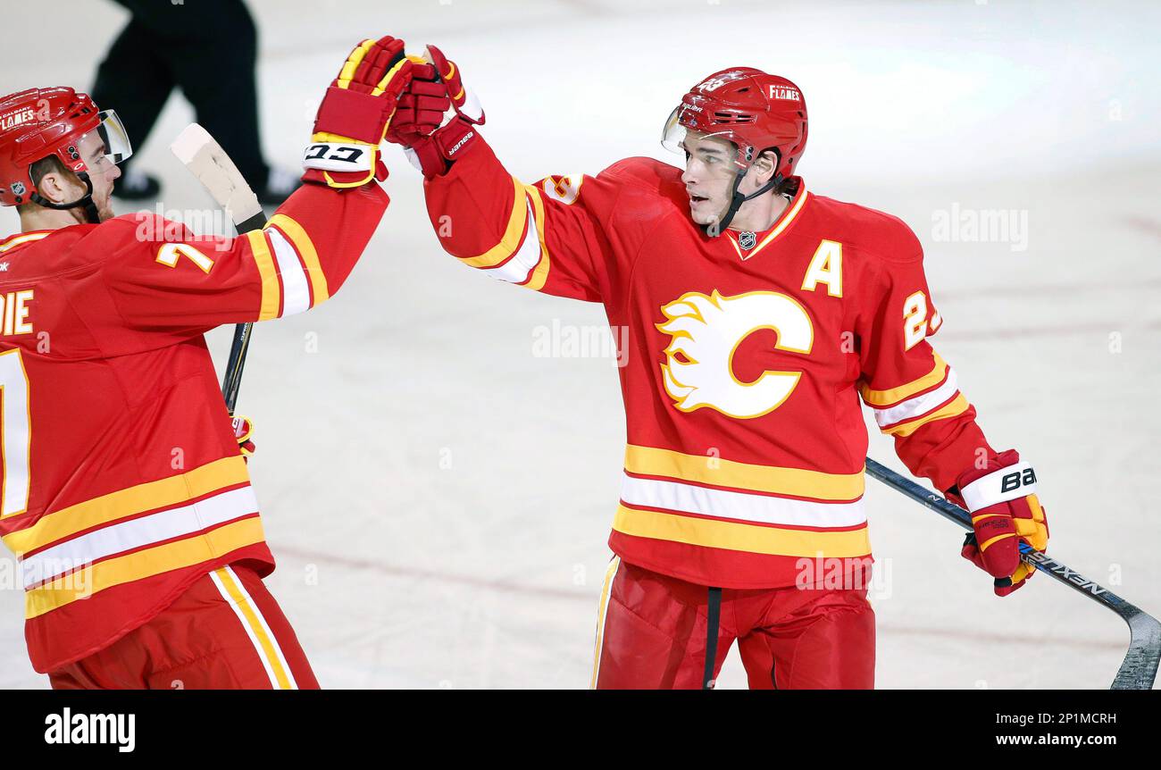 NHL profile photo on Calgary Flames' Sean Monahan, right, celebrating a ...