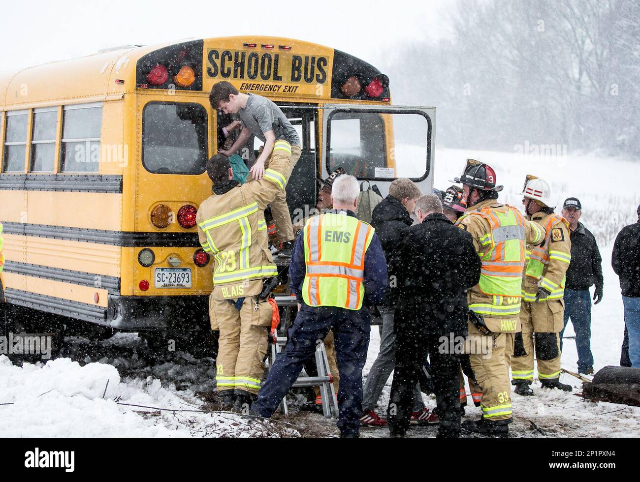 Emergency personnel work the scene of a fatal accident involving a ...