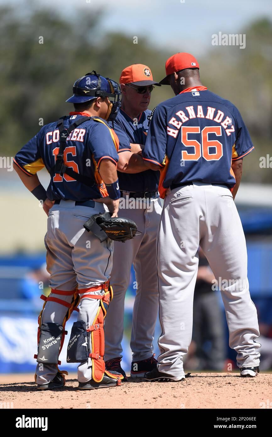 Houston Astros pitching coach Brent Strom (53 - center) talks with ...