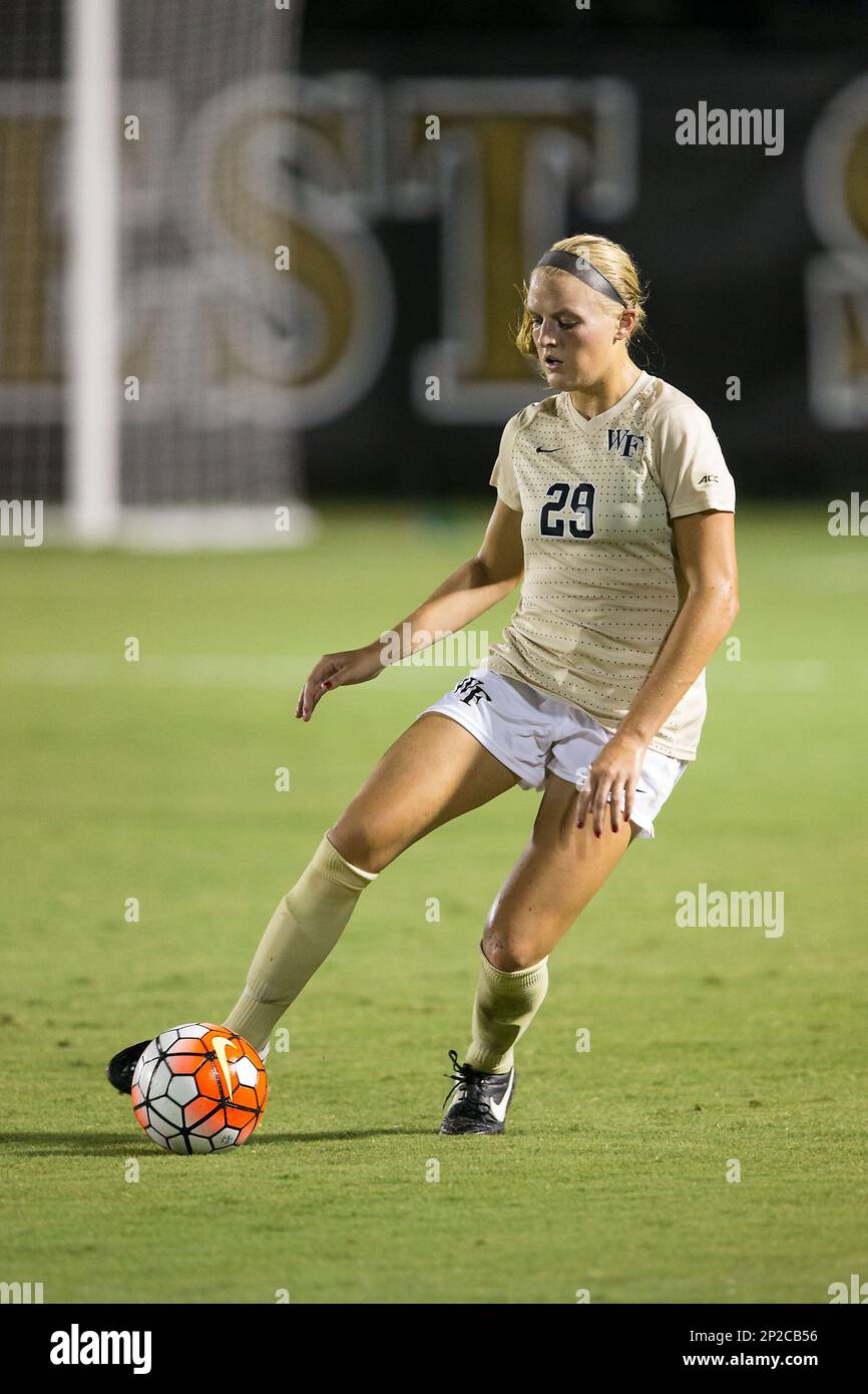 Kate Ravenna (29) of the Wake Forest Demon Deacons controls the ball ...