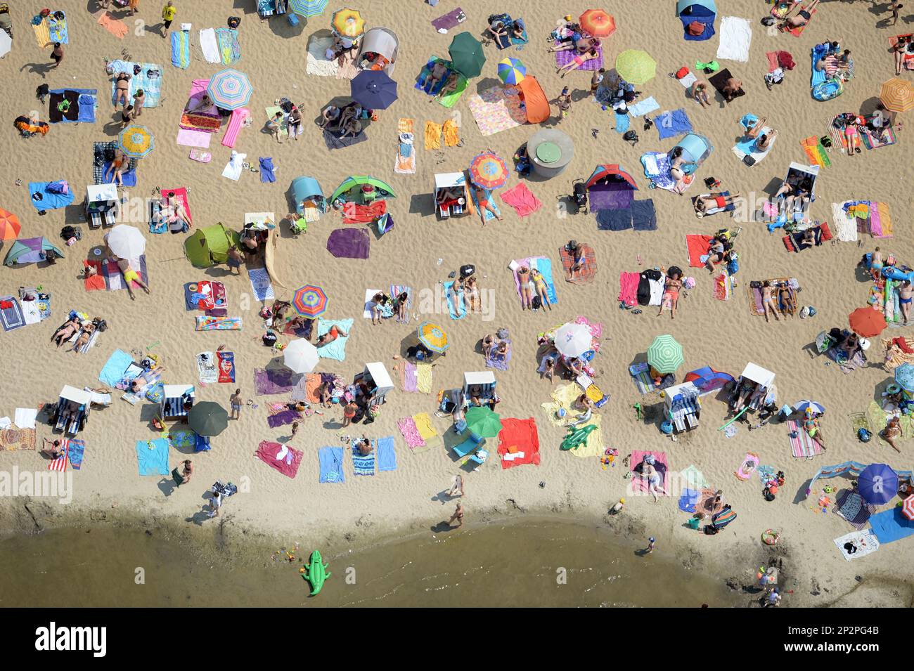 In this aerial view visitors enjoy the sun at Lake Wannsee public pool ...