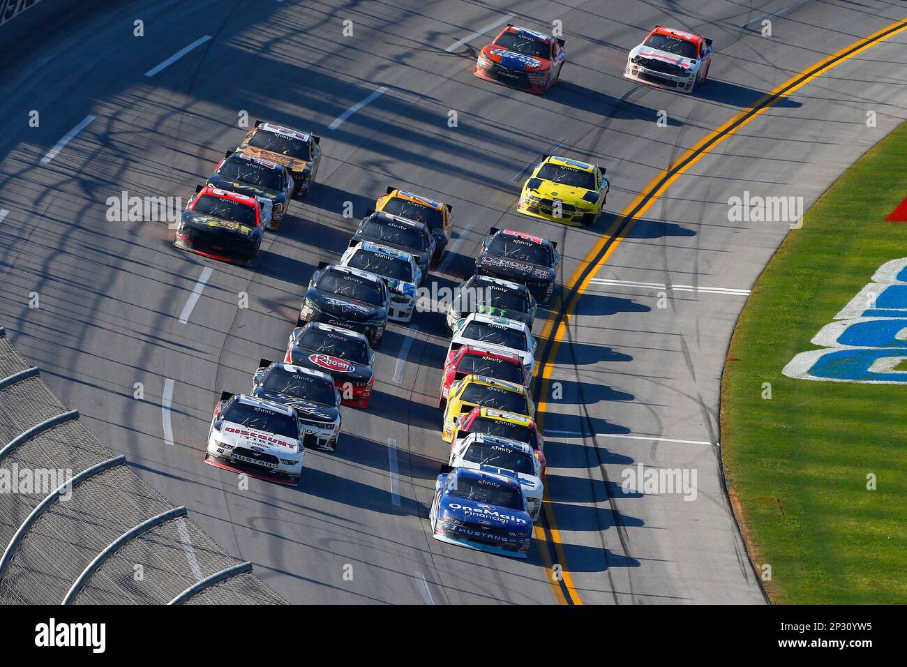 Elliott Sadler (1), Aric Almirola (98) and Joey Logano (22) during the ...