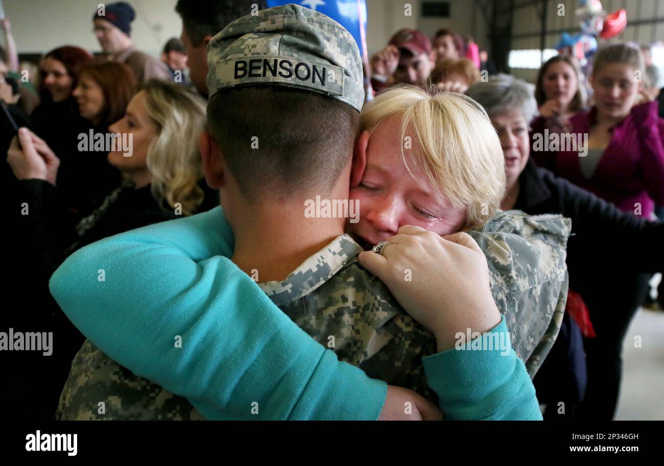 Minnesota National Guard Spc. Hailey Benson is greeted by her sister ...