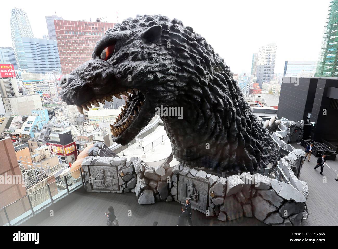 Godzilla's head is unveiled during the opening ceremony of the newly ...