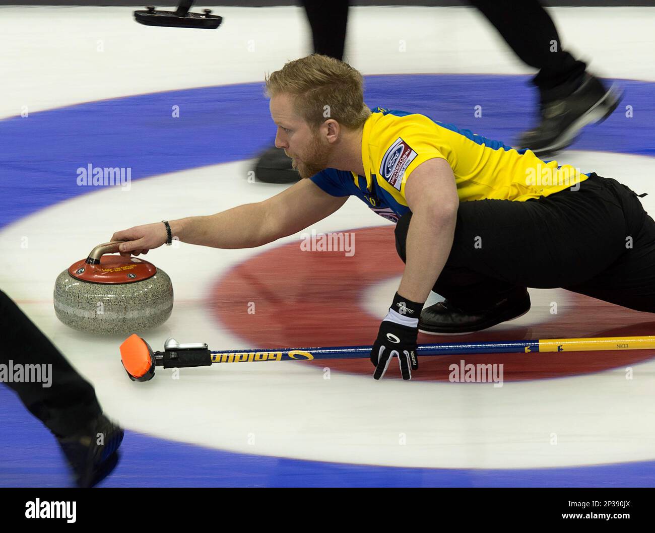 Sweden skip Niklas Edin releases a rock in playoff match against Canada ...