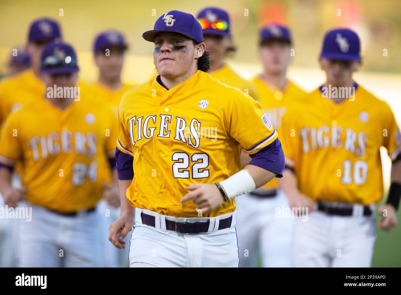 March 31, 2015 - LSU catcher Kade Scivicque (22) leads the team into ...