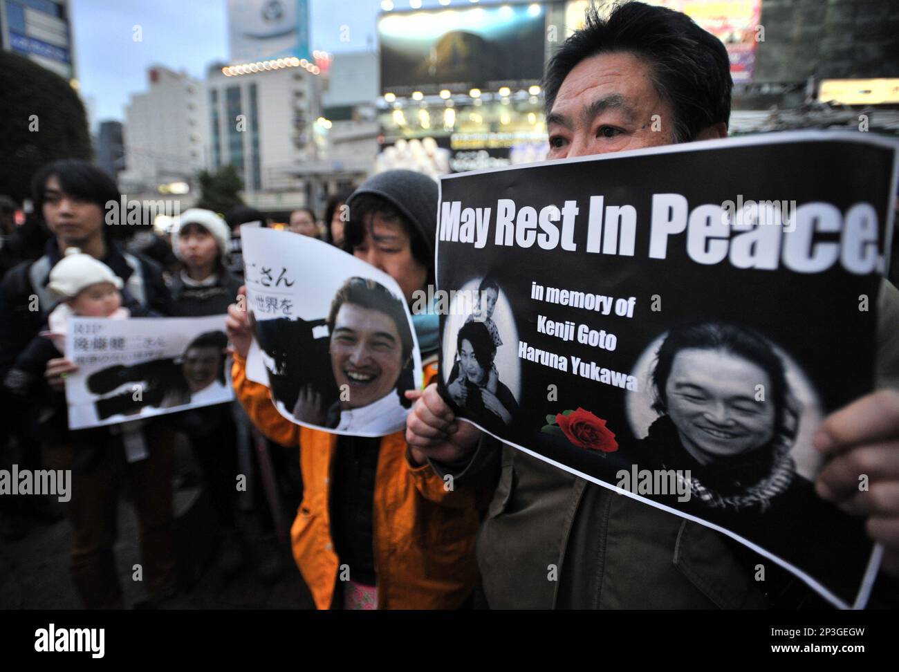 Participants gather to offer prayers for Japanese hostage victims ...