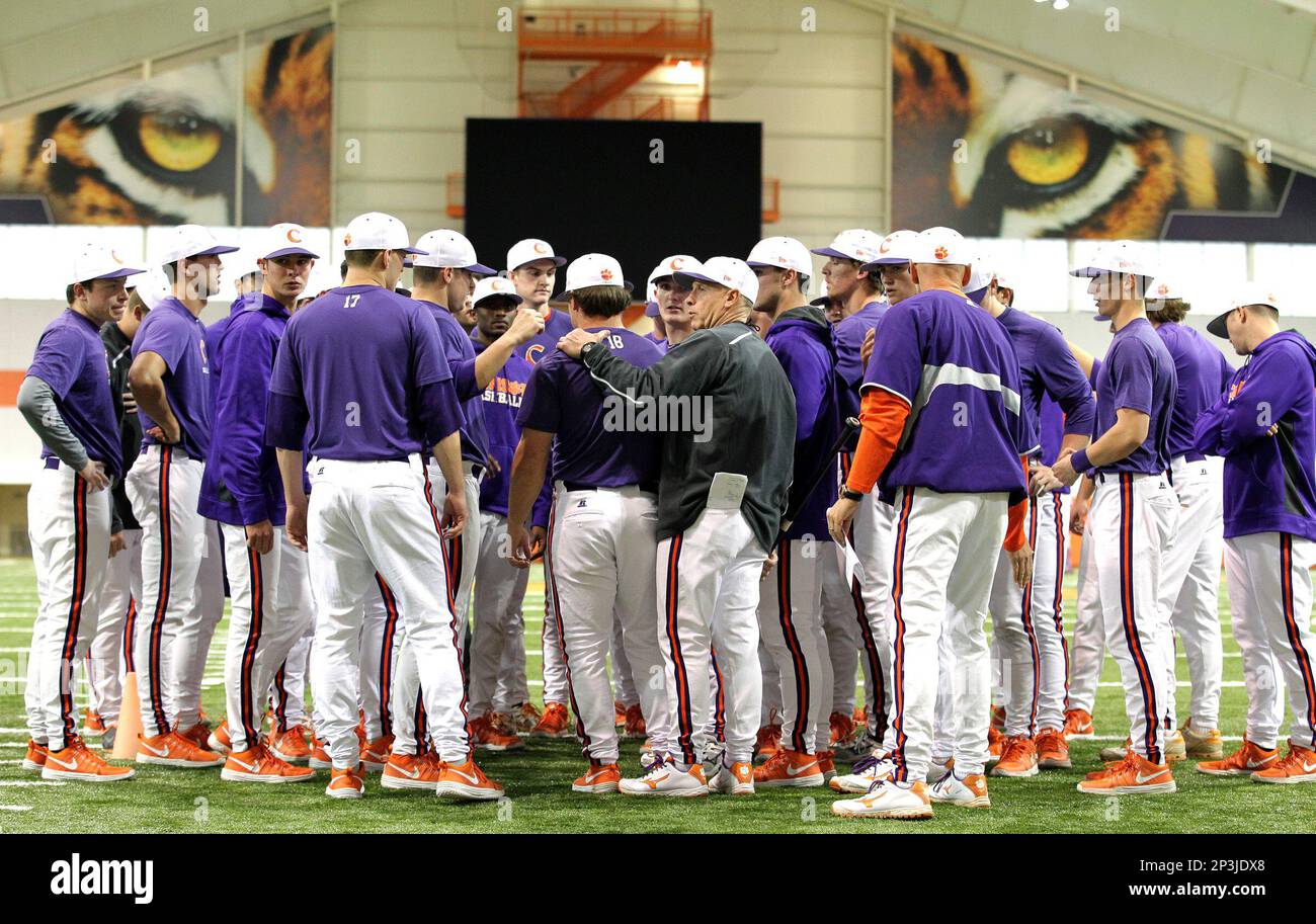The Clemson team huddles with head coach Jack Leggett, center right ...