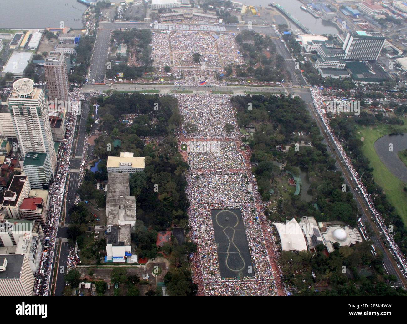 In this aerial photo provided by the Philippine Air Force, a massive ...