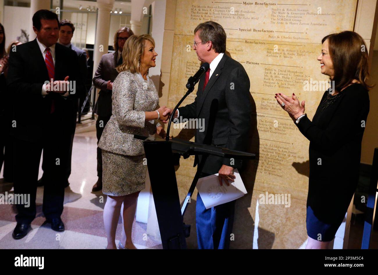 In this Saturday Jan. 10, 2015 photo, Oklahoma Gov. Mary Fallin, center ...
