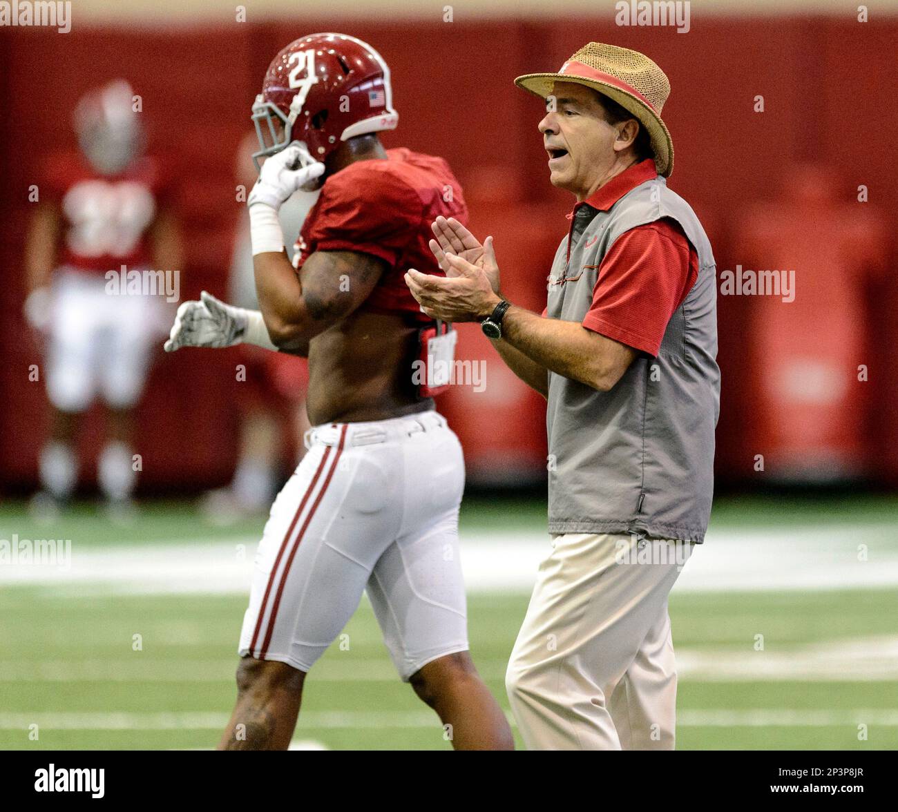 Alabama head coach Nick Saban cheers his players as they work through ...