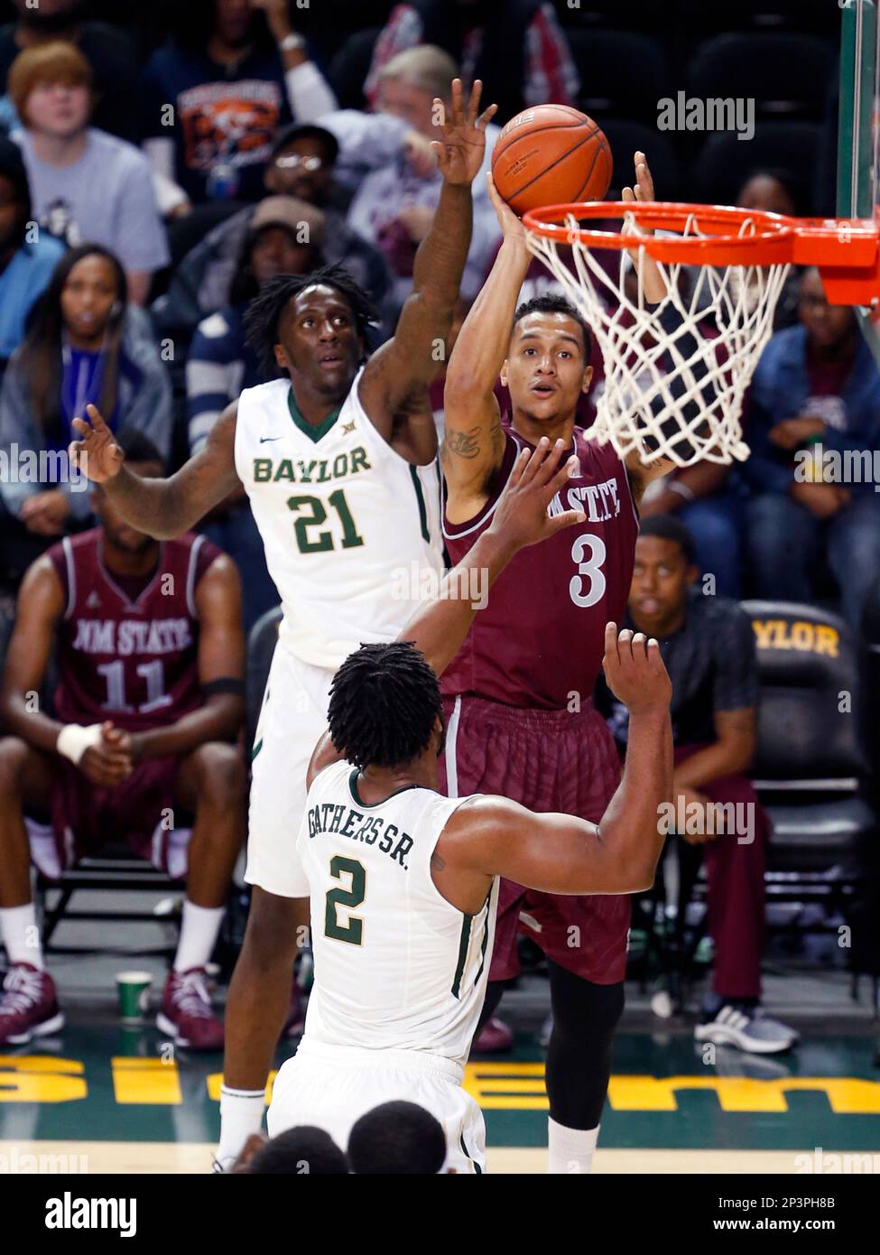 New Mexico State forward Remi Barry (3) attempts a shot between Baylor ...