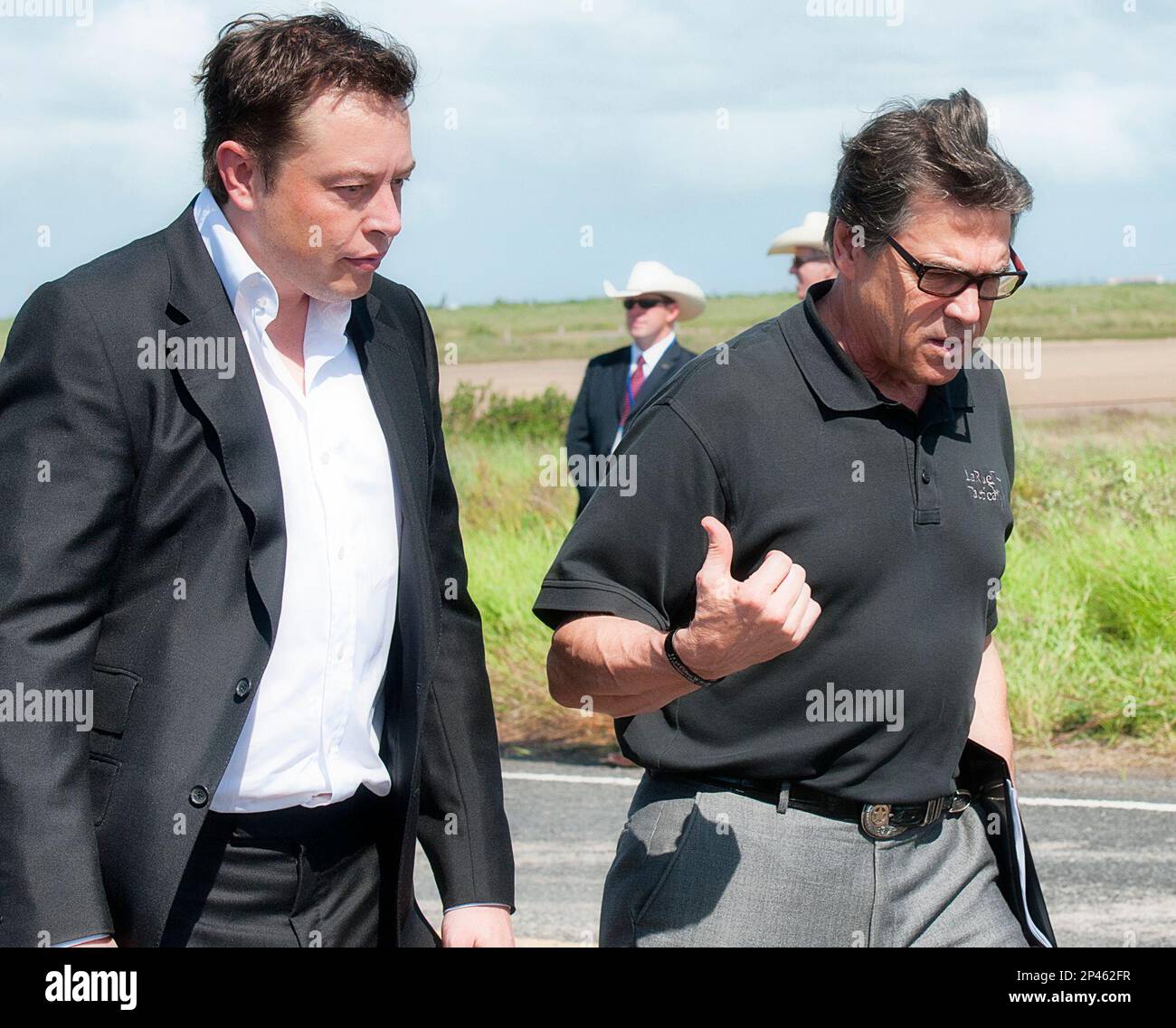 SpaceX founder and CEO Elon Musk, left, and Texas Gov. Rick Perry ...