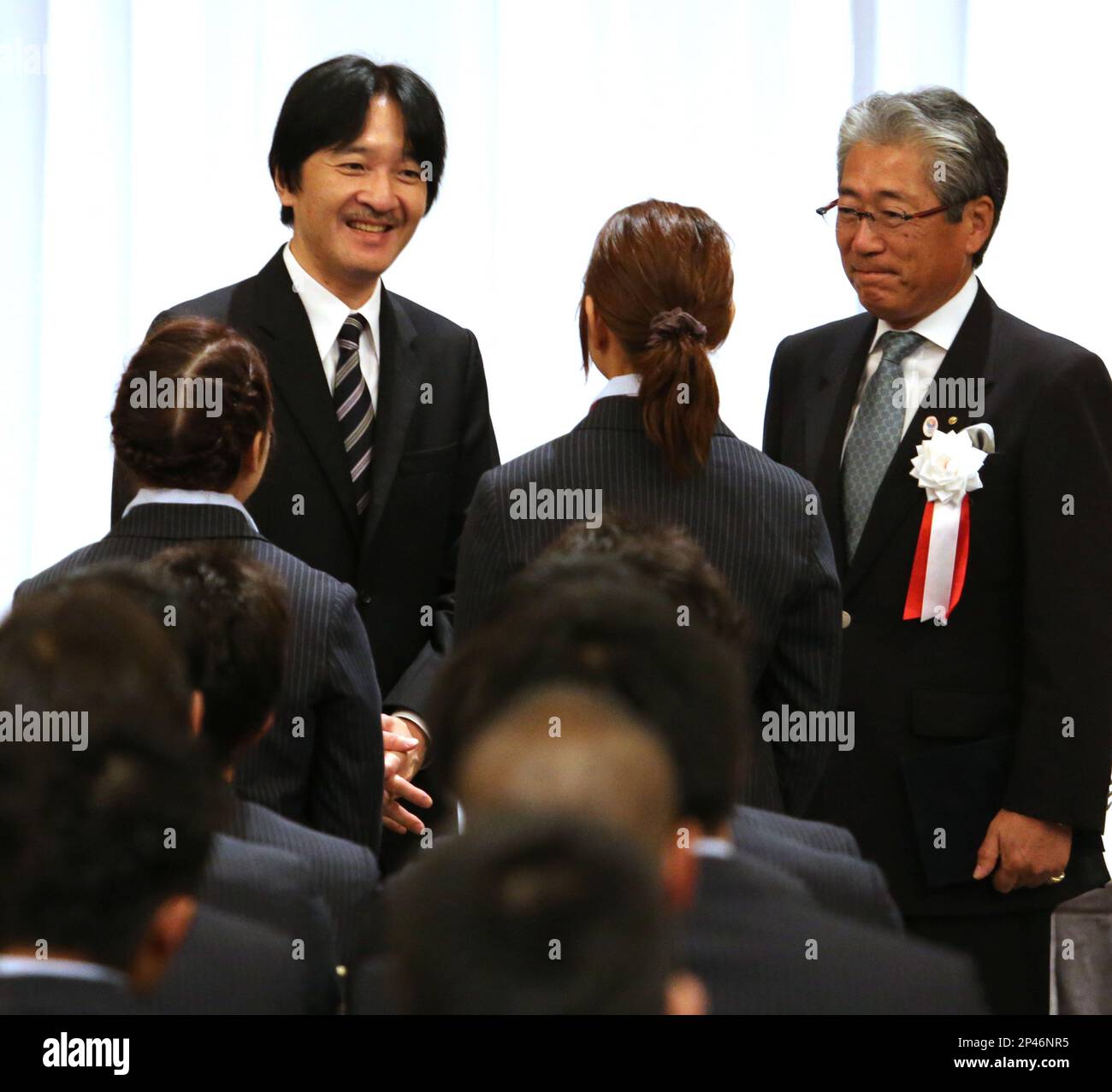Prince Akishinomiya (2nd from L) with Tsunekazu Takeda (R), chairman of ...