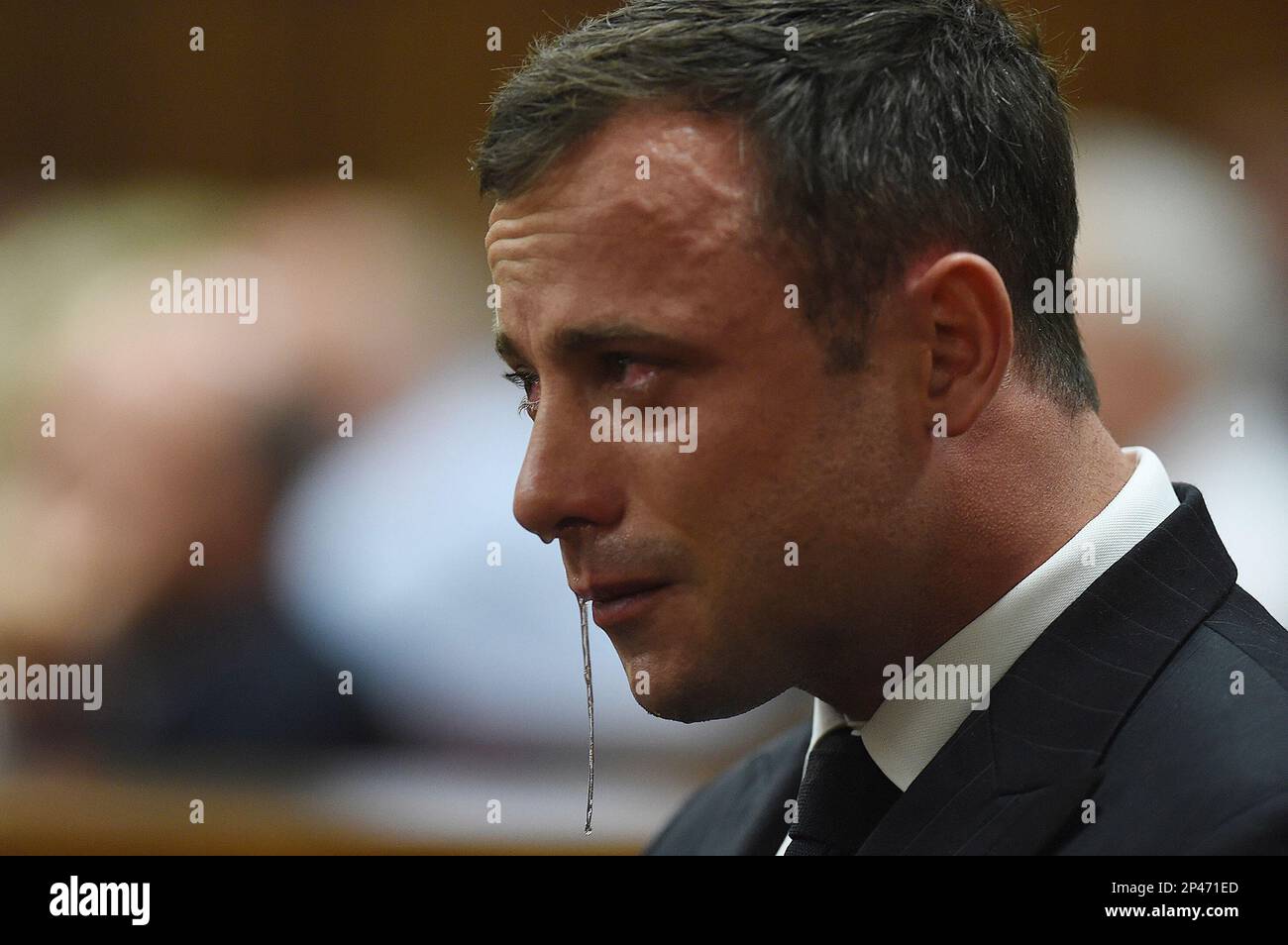 Oscar Pistorius cries in the dock in Pretoria, South Africa, Thursday ...