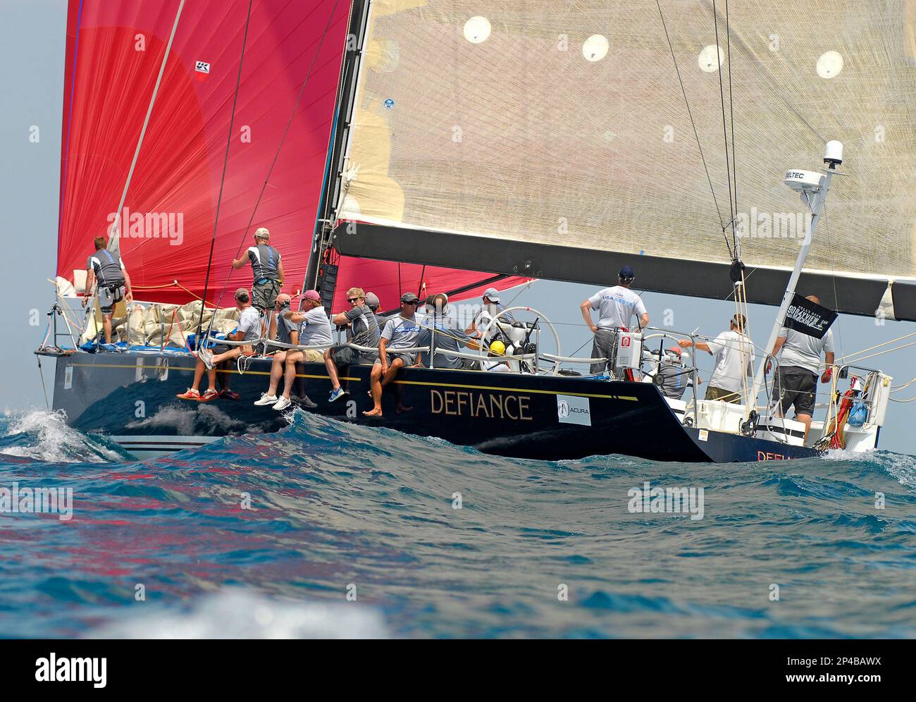 Defiance, of the Chicago Yacht Club, passes the starting line in PHRF A ...