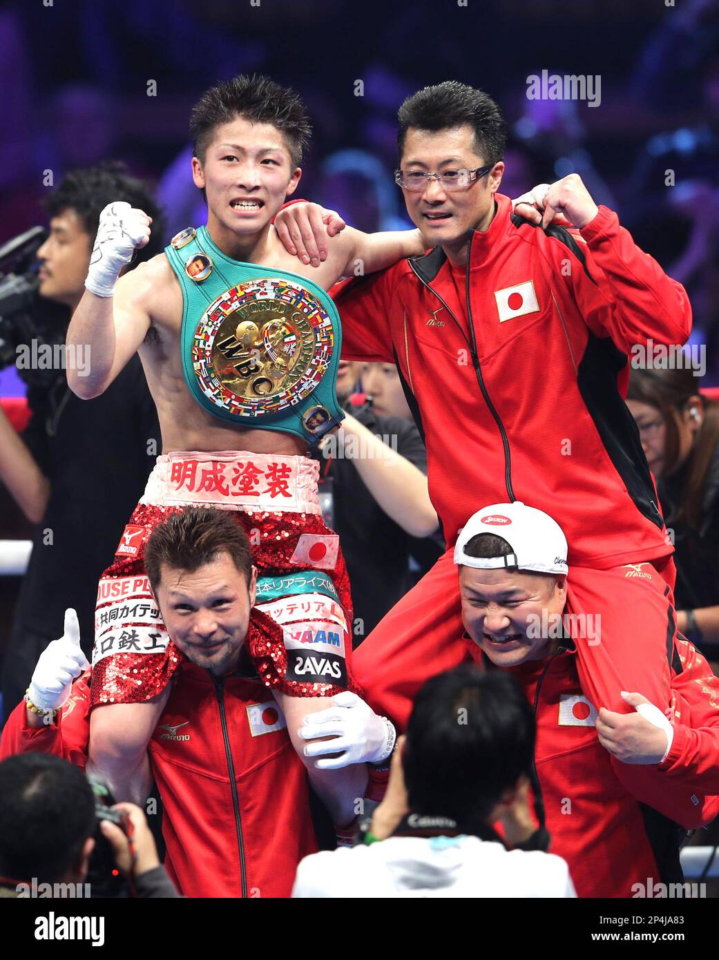 Japan's Naoya Inoue (L) and his father and tainer Shingo Inoue (R ...