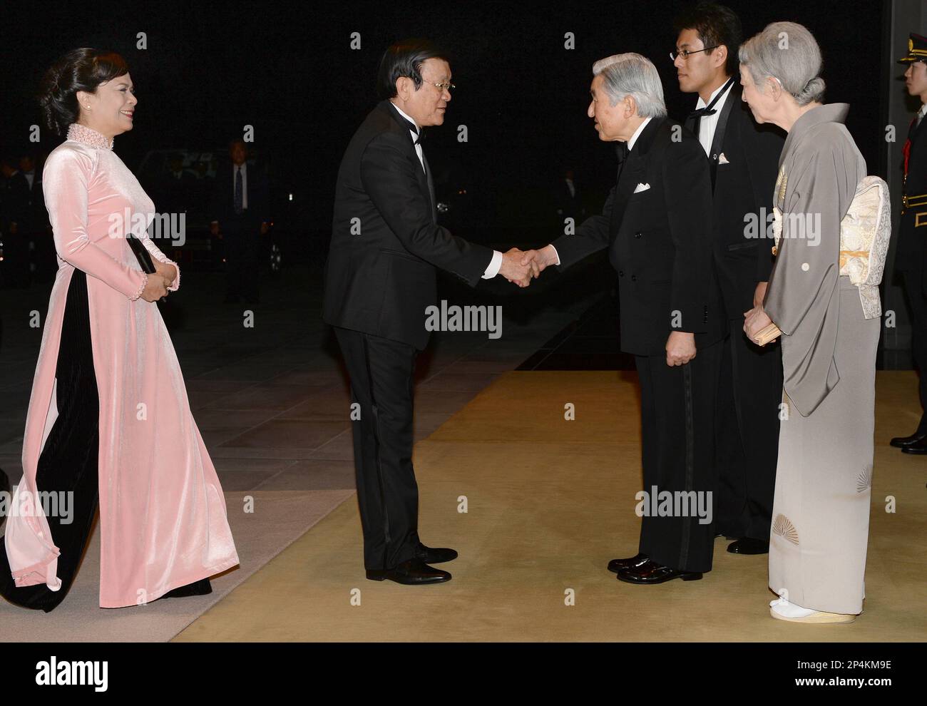 Vietnam's President Truong Tan Sang, second from left, and his wife Mai ...