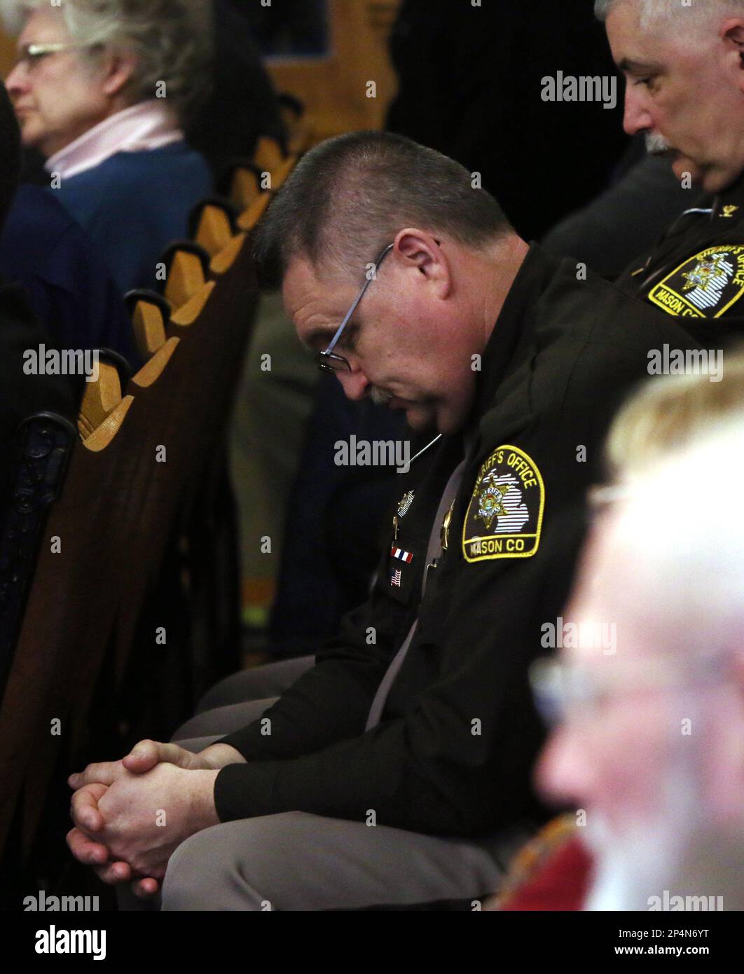 Mason County Sheriff Kim Cole listens to Mason County Prosecutor Paul ...