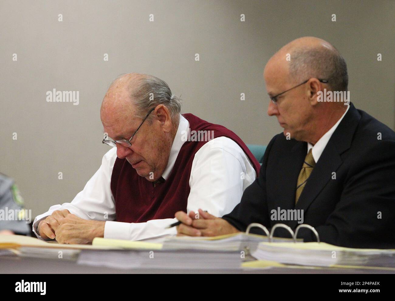 Retired Tampa Police captain Curtis Reeves, Jr., left, cries as he ...