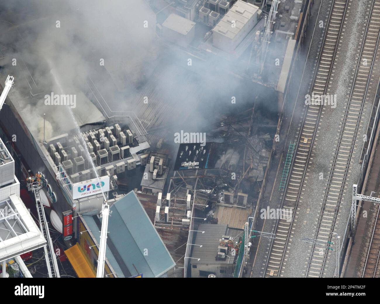 A photo shows a fire breaking and volumes of somoke rising near ...