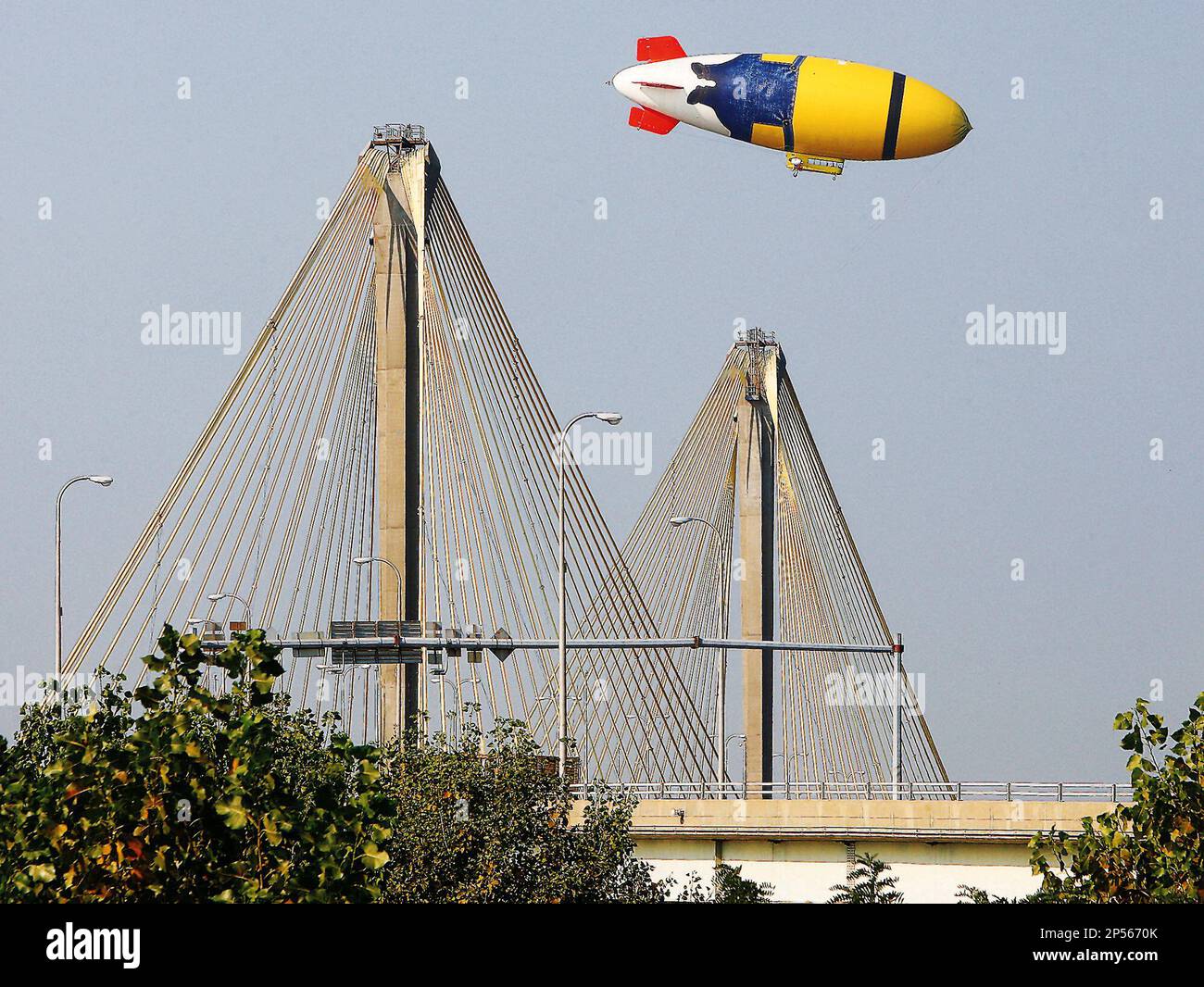 The "Despicablimp" floats low over the Clark Bridge on the Alton, Ill ...