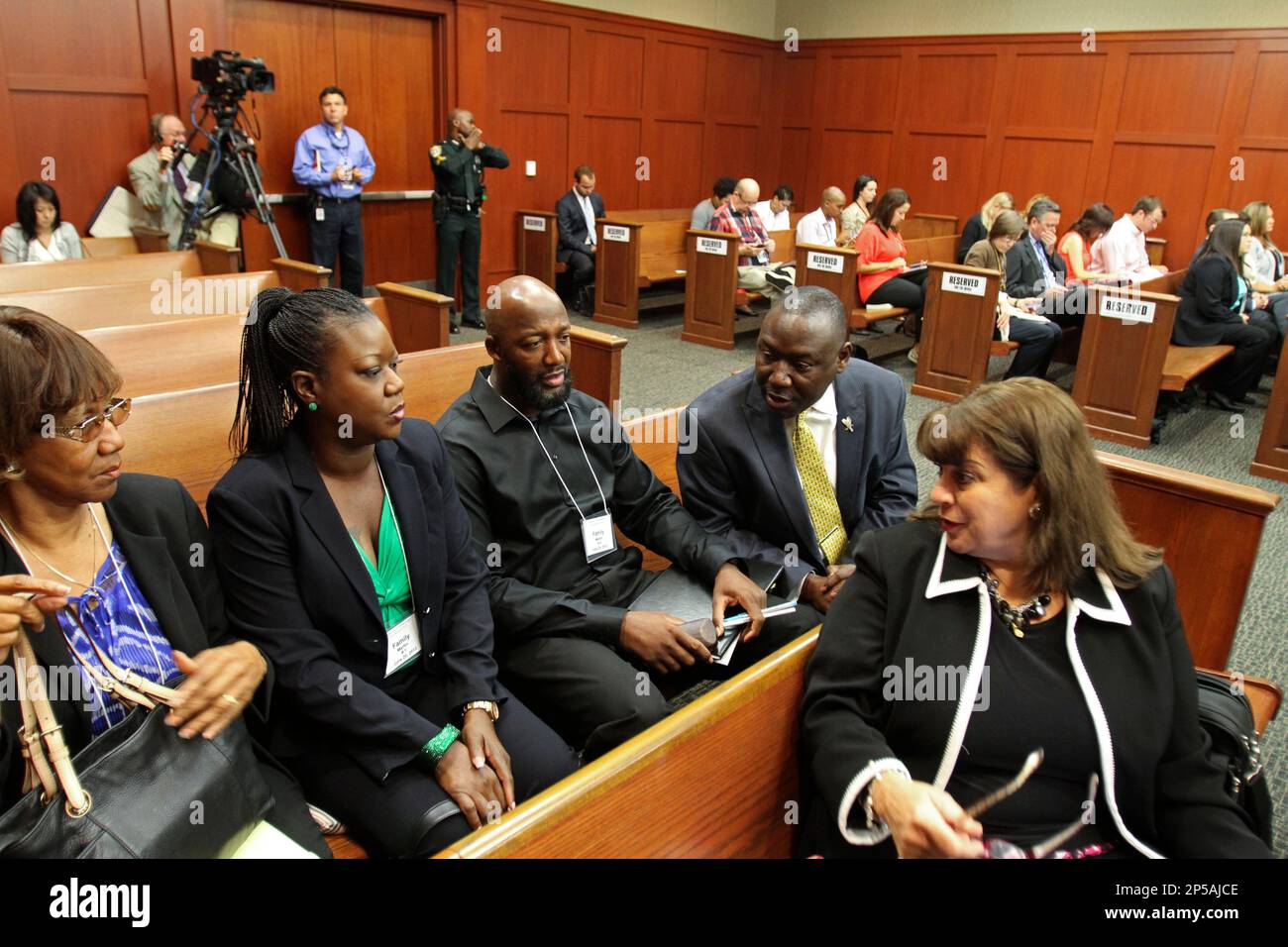 State attorney Angela Corey, right, talks with Stephanie Fulton Sands ...