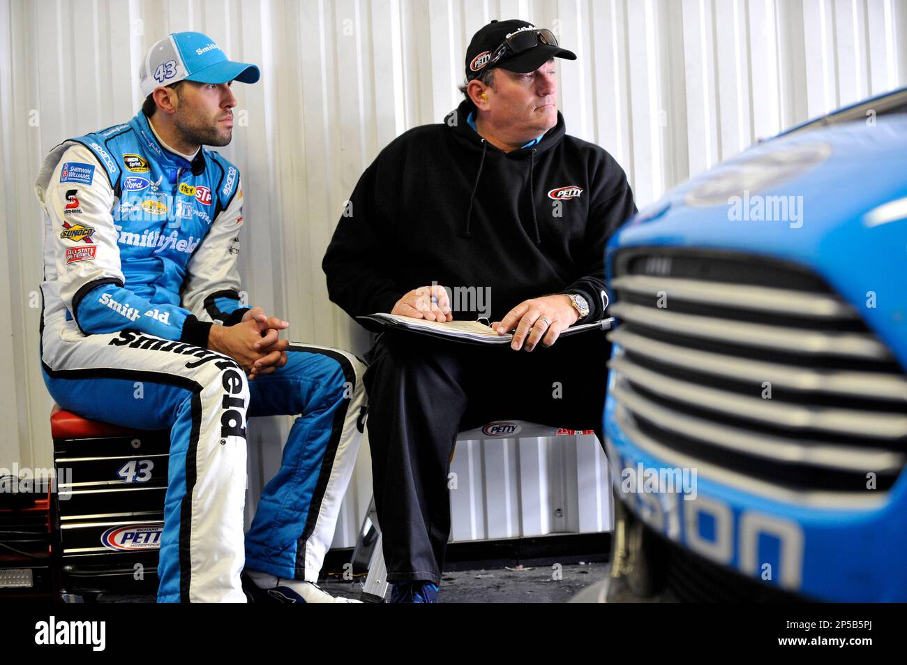 Aric Almirola (left) and Todd Parrott (right) during practice for the ...