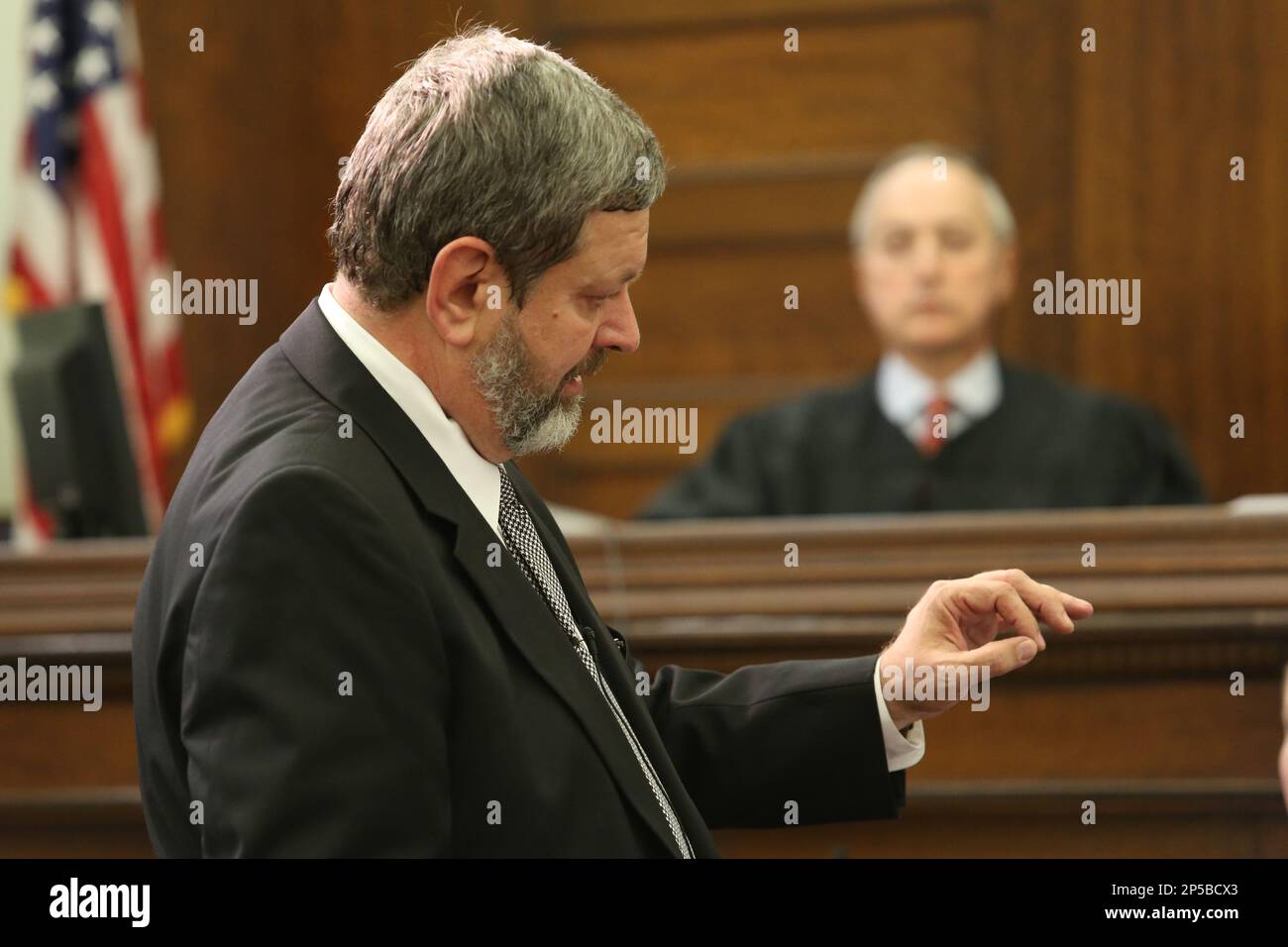Defense attorney Roger Falk questions Brett Seacat about the ...