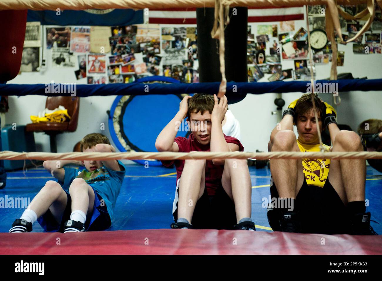 In this Thursday, Feb. 14, 2013 photo, from left, Nick Young, 11, Zack ...