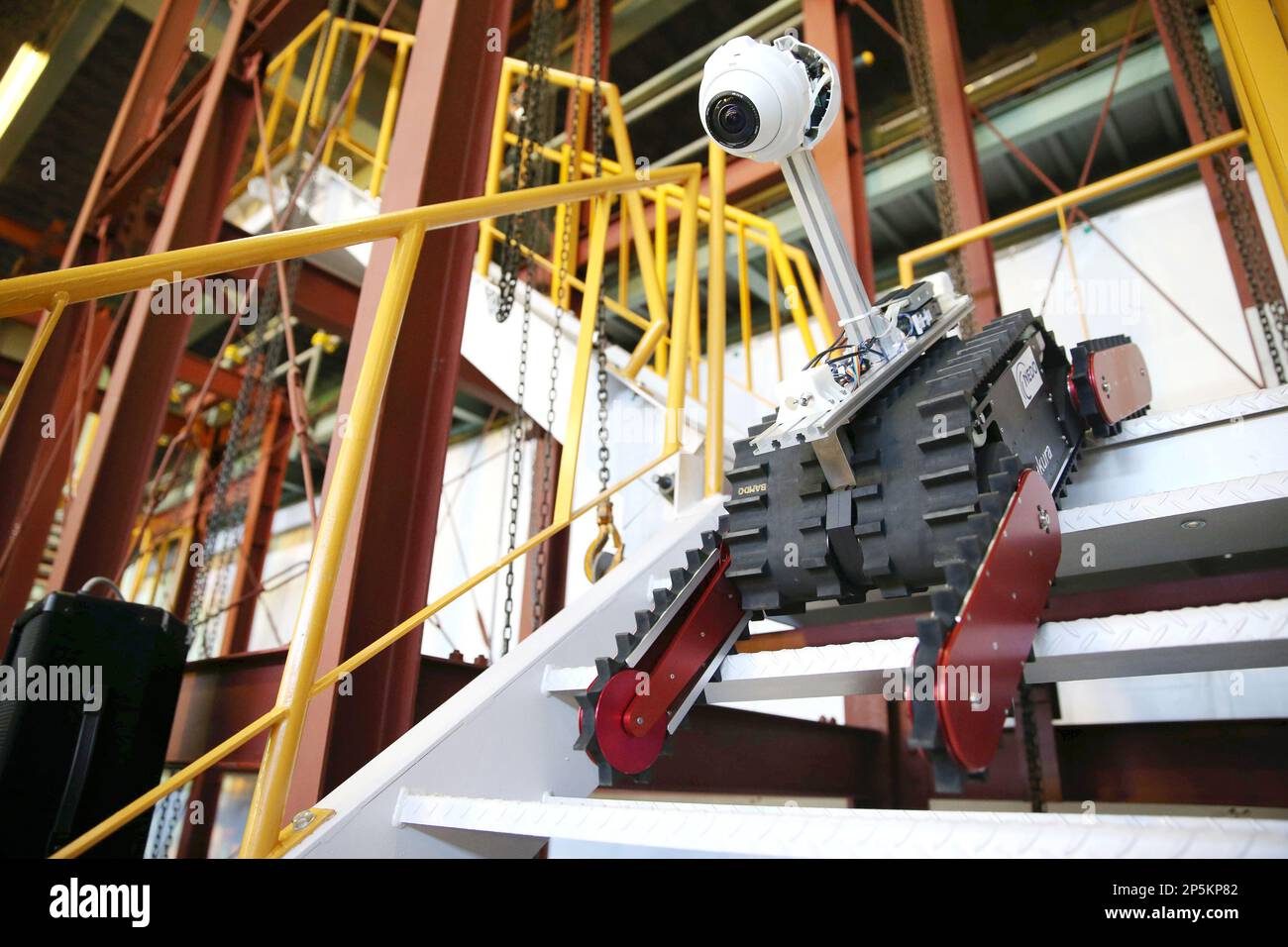 "Sakura,'' a remote-controlled robot, is demonstrated during unmanned ...