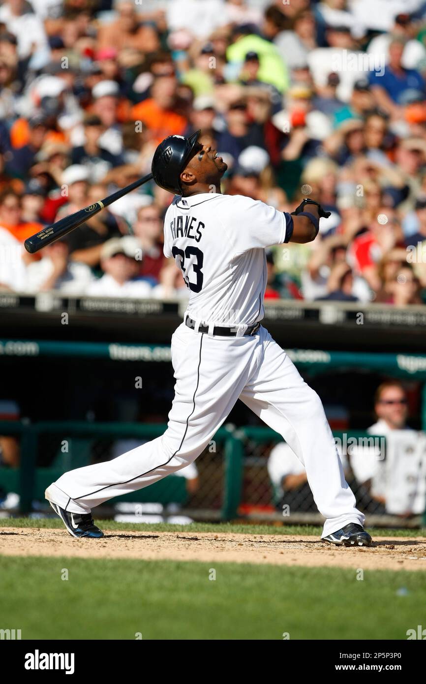 DETROIT, MI - AUGUST 29: Designated hitter Marcus Thames #33 of the Detroit Tigers follows ...