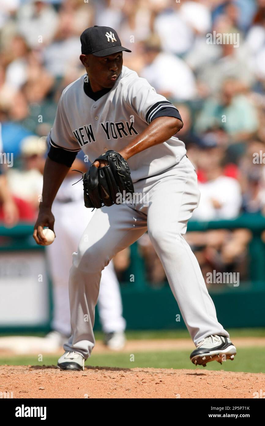 CLEVELAND, OH - AUGUST 12: Pitcher Luis Vizcaino #52 of the New York ...