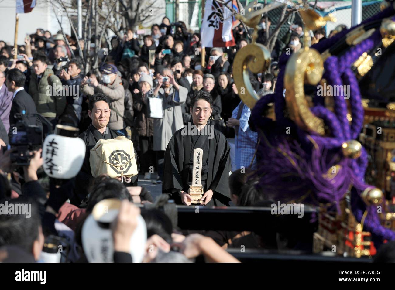 About 700 people, including those carrying a mikoshi portable shrine ...