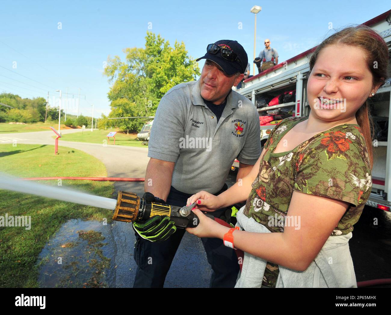 Gannon Jackson, 11, of Jemison, Ala. looks back as a Huntsville ...