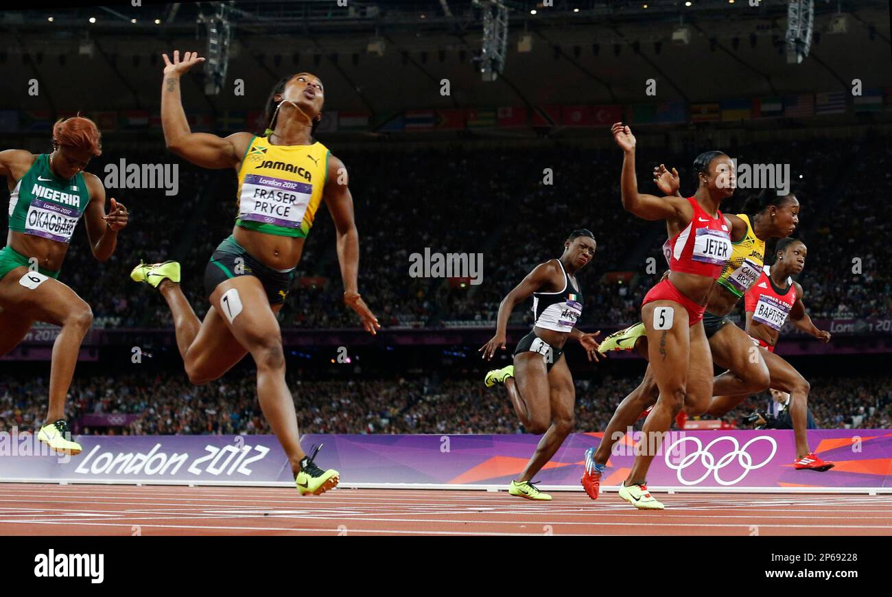 Jamaica's Shelly-Ann Fraser-Pryce, second from left, crosses the finish line to win gold ahead ...