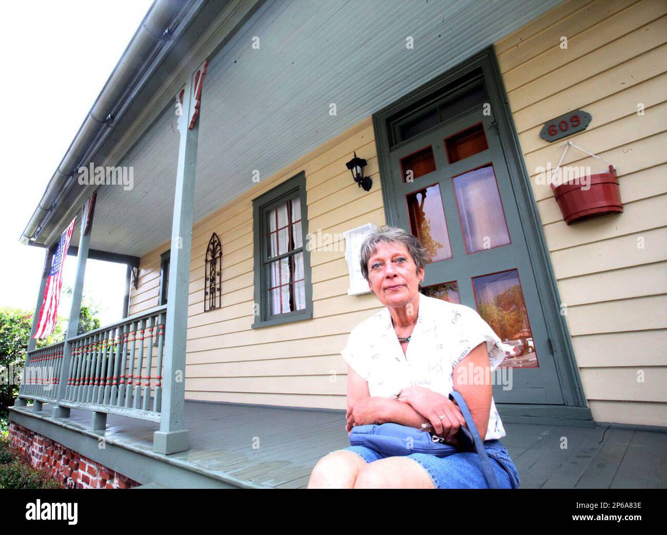Lili Pasteur of Joppe, Netherlands, sits at the boyhood home of James ...