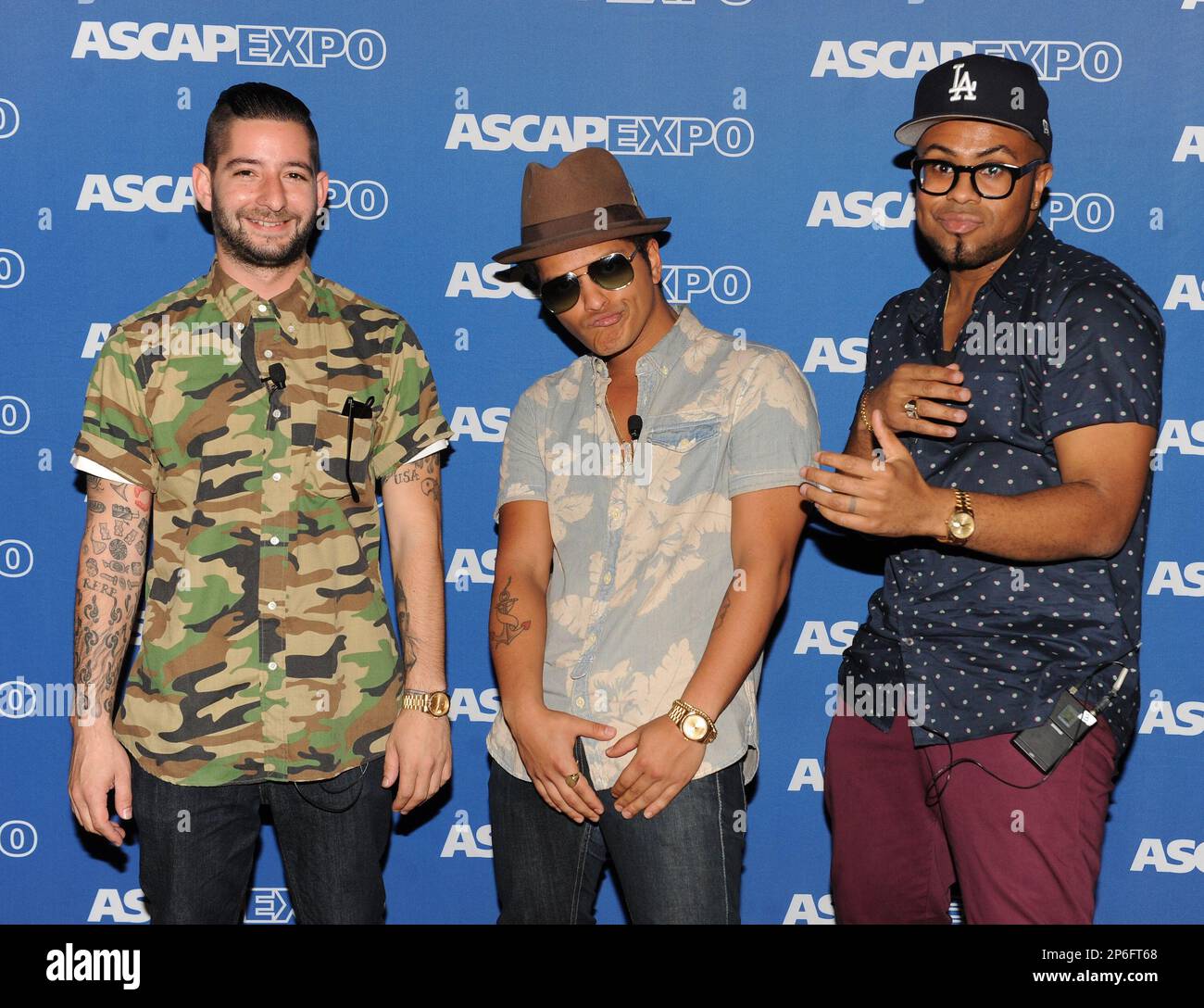 HOLLYWOOD, CA - APRIL 20: (L-R) Ari Levine, Bruno Mars and Philip Lawrence of The Smeezingtons ...