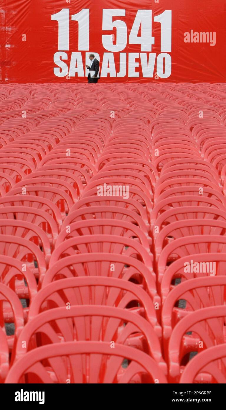 Red chairs are displayed along a main street in Sarajevo as the city ...