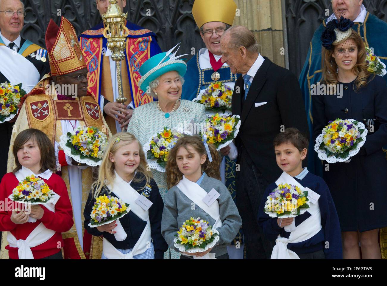 Centre row from left, Archbishop of York John Sentamu, Britain's Queen ...
