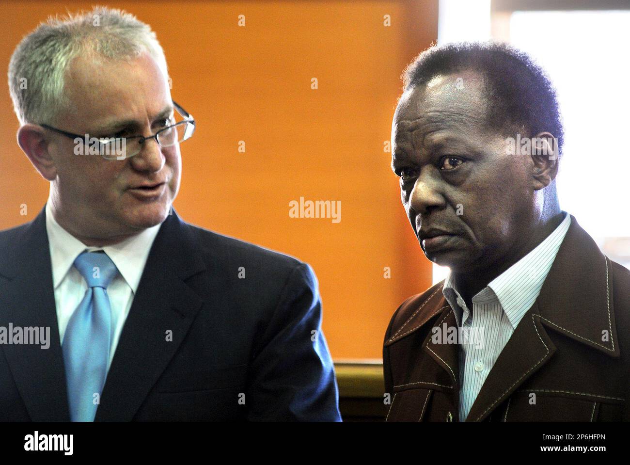 Onyango Obama, the uncle of President Barack Obama, right, stands with ...
