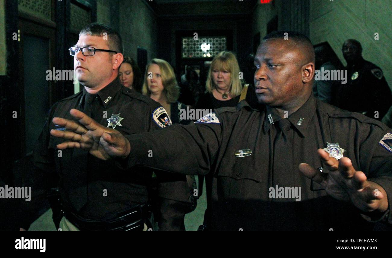 Hinds County Sheriff's Deputies lead members of Deryl Dedmon's family ...