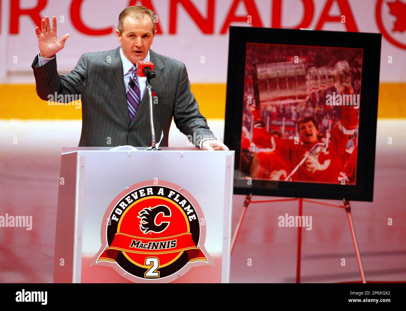 Calgary Flames great Al MacInnis speaks during a ceremony to honor him ...
