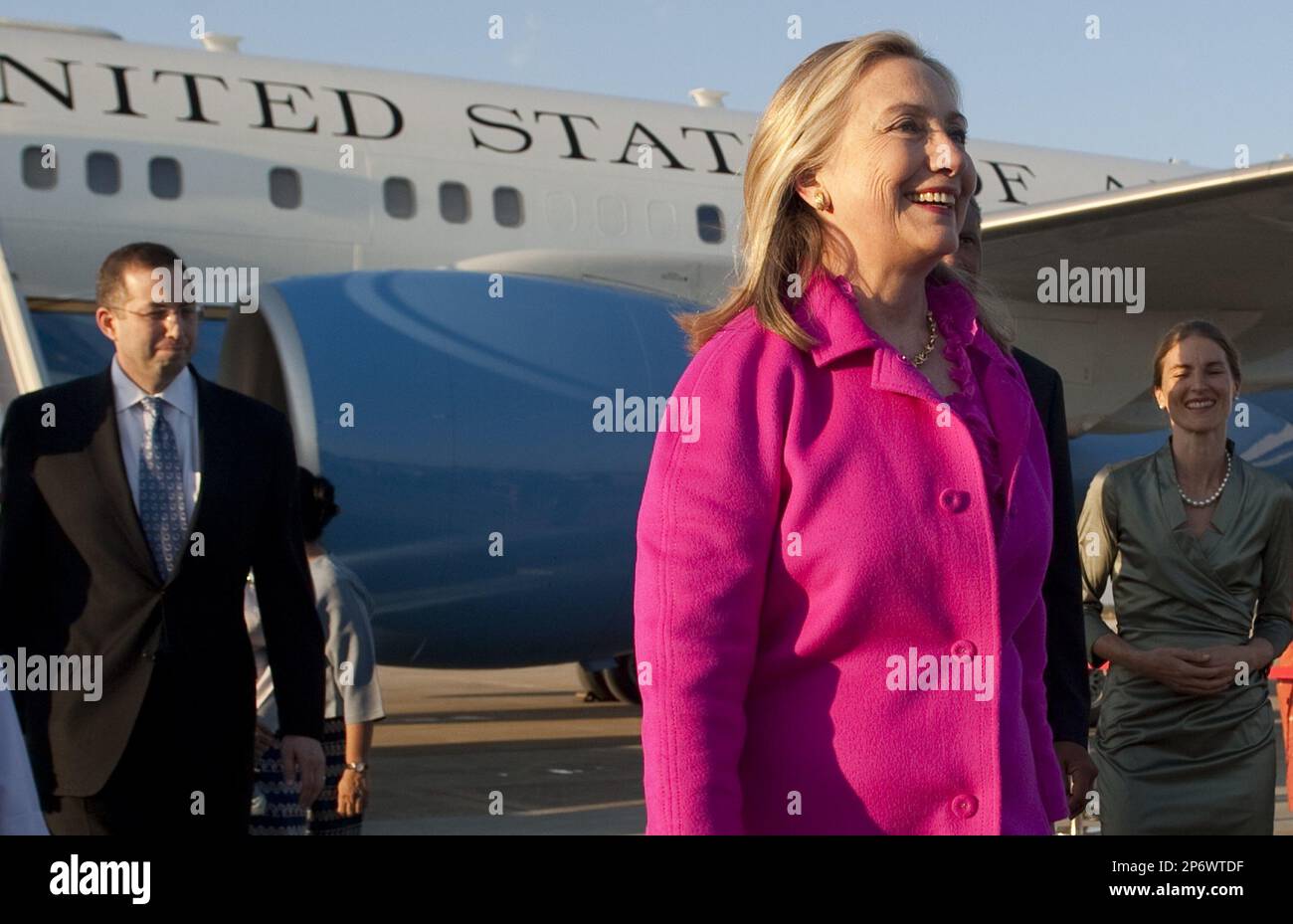 U.S. Secretary of State Hillary Rodham Clinton smiles as she walks from ...