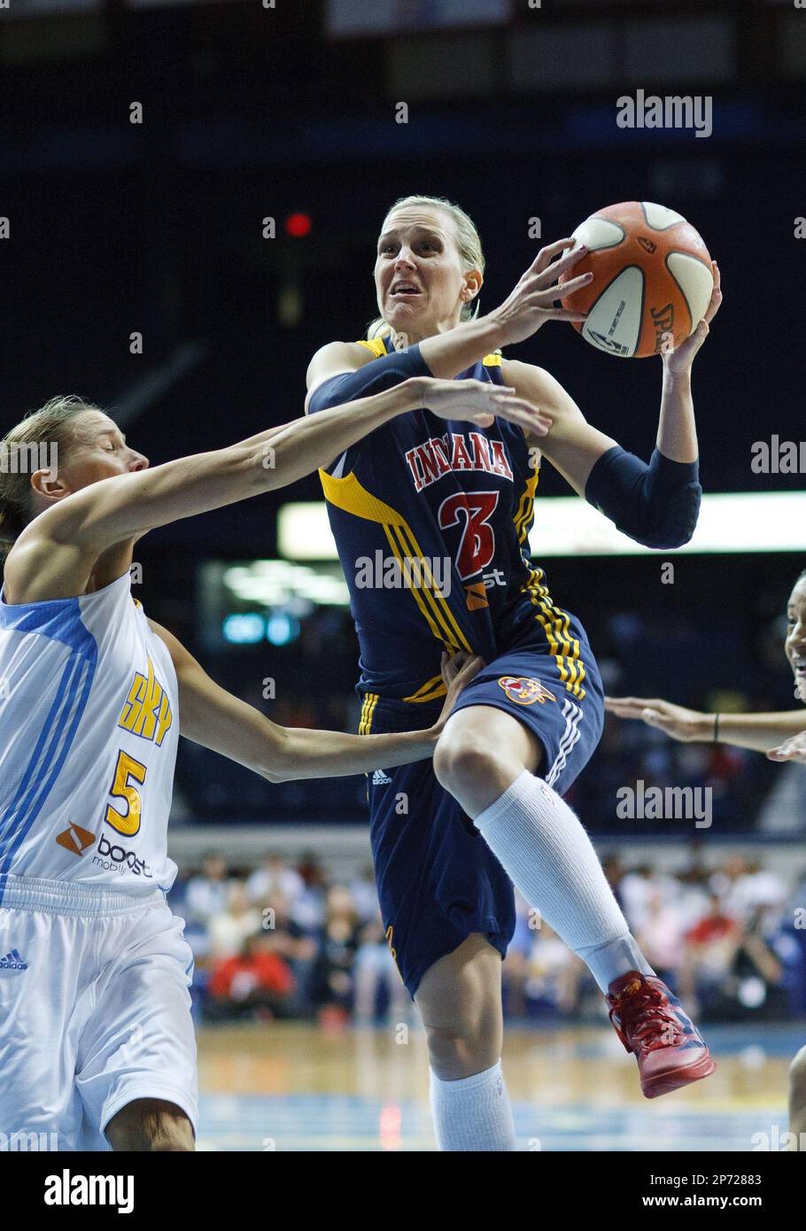 September 04 2011: Katie Douglas of the Indiana Fever drives past Erin ...