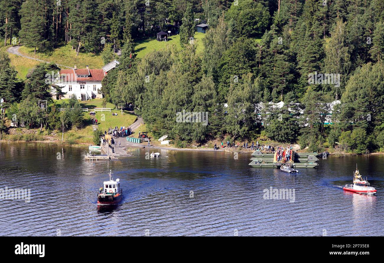 Survivors and their relatives of the July 22 attack visit the island of ...