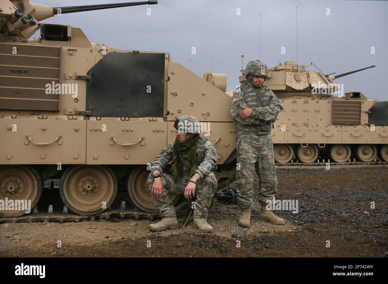 In this July 25, 2011 photo, Pfc. Edward Bushnell, left, of Spokane ...
