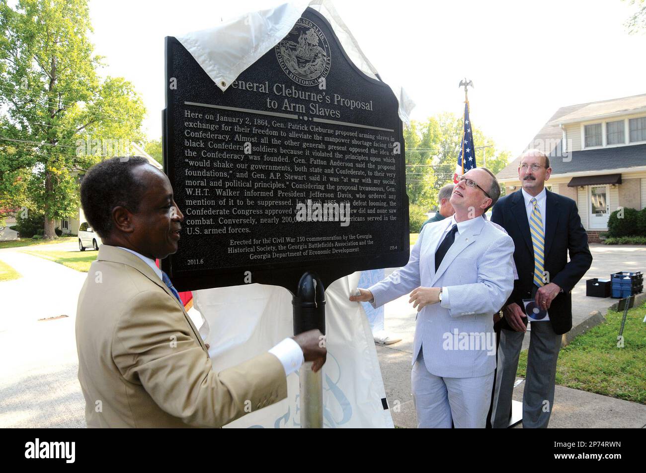 Michael Thurmond, left, and Dr. W. Todd Groce reveal the Historical ...
